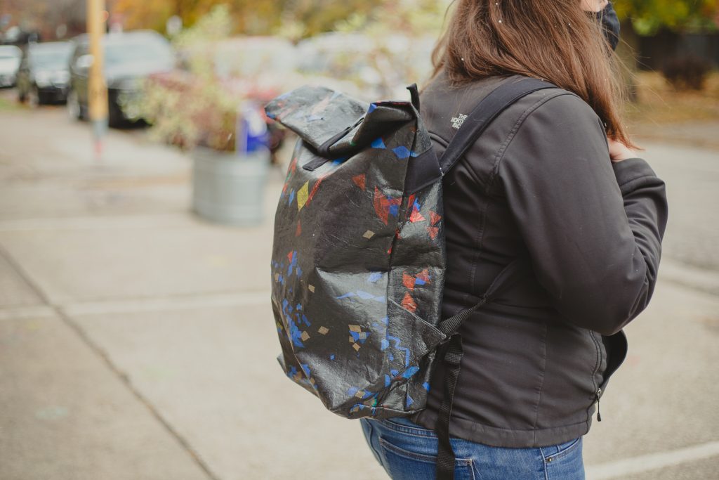 Deluxe Backpack Made From Recycled Plastic Bags - Drink Local Drink Tap