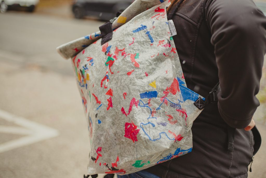 Deluxe Backpack Made From Recycled Plastic Bags - Drink Local Drink Tap
